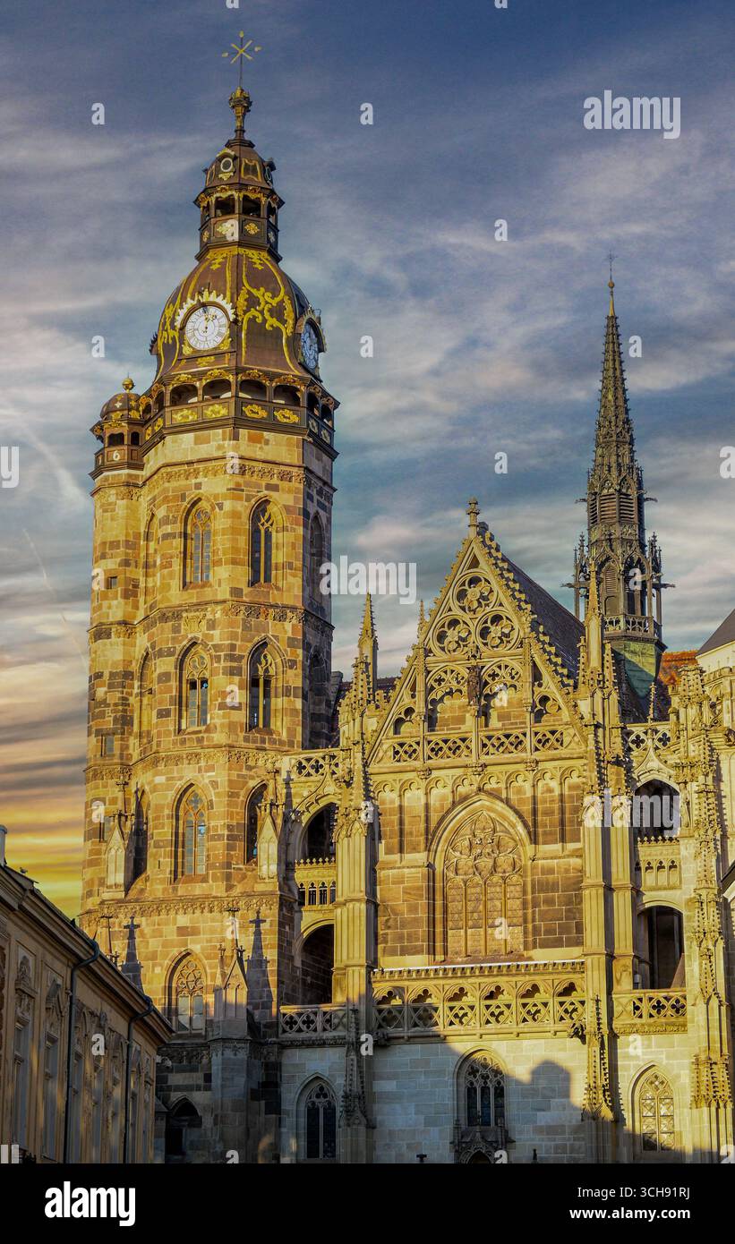 Majestic kosice cathedral standing tall against a vibrant sunset sky ...