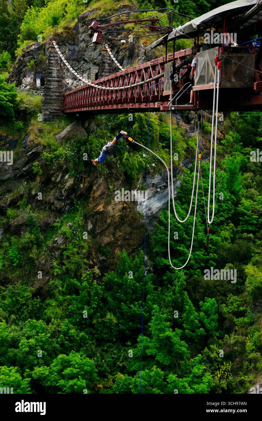 Man bungee jumping off Kuwara Bridge over Kawarau River, New Zealand ...