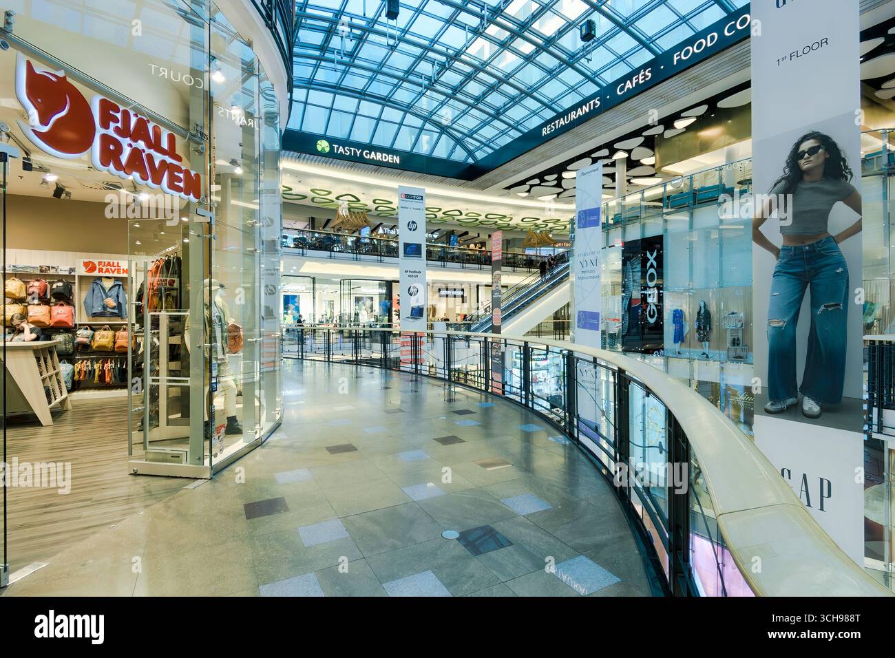 The multi-level interior of the Palladium mall - a modern shopping ...