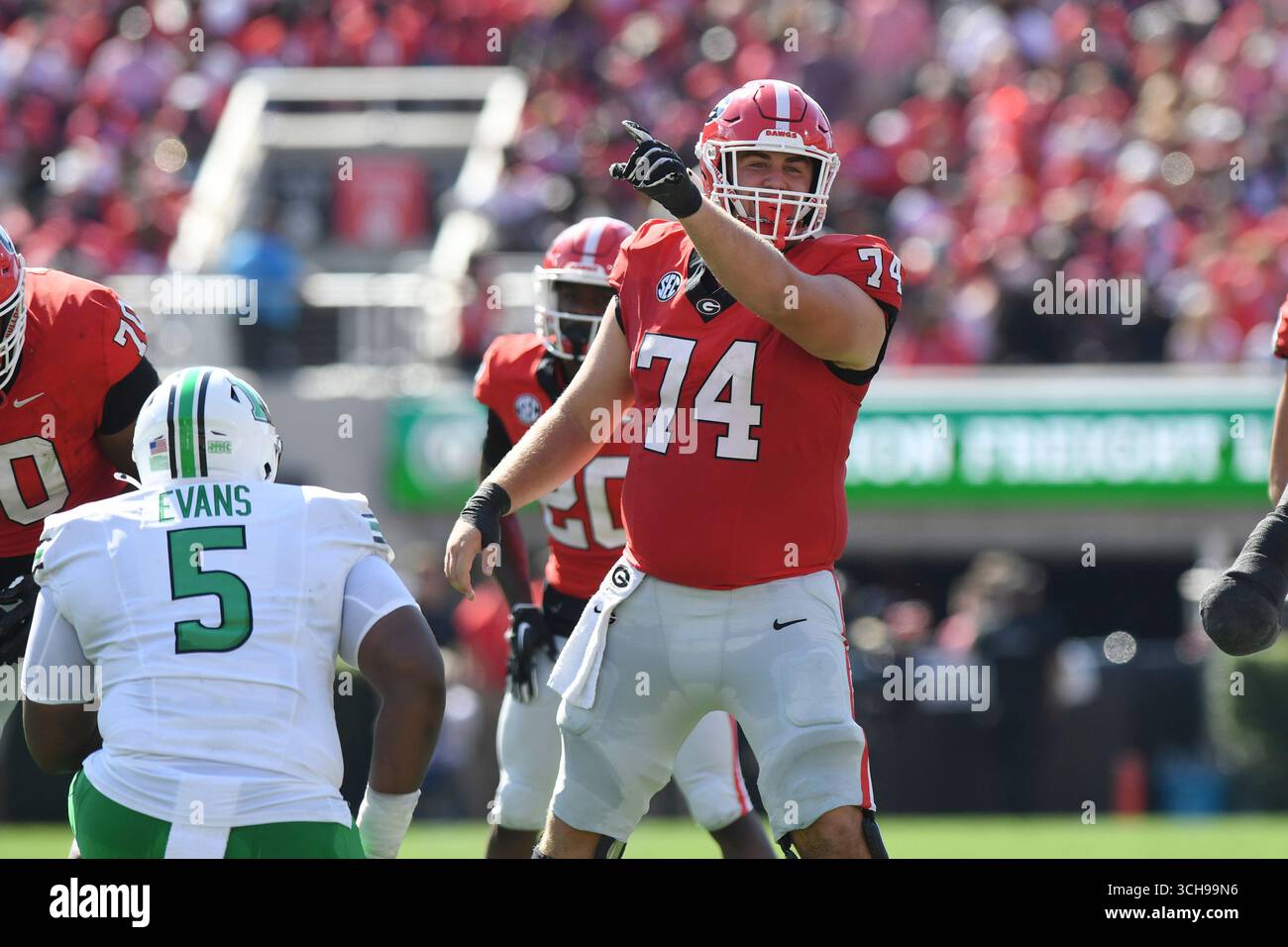 ATHENS, GA - AUGUST 30: Drew Bobo #74 of the Georgia Bulldogs points ...
