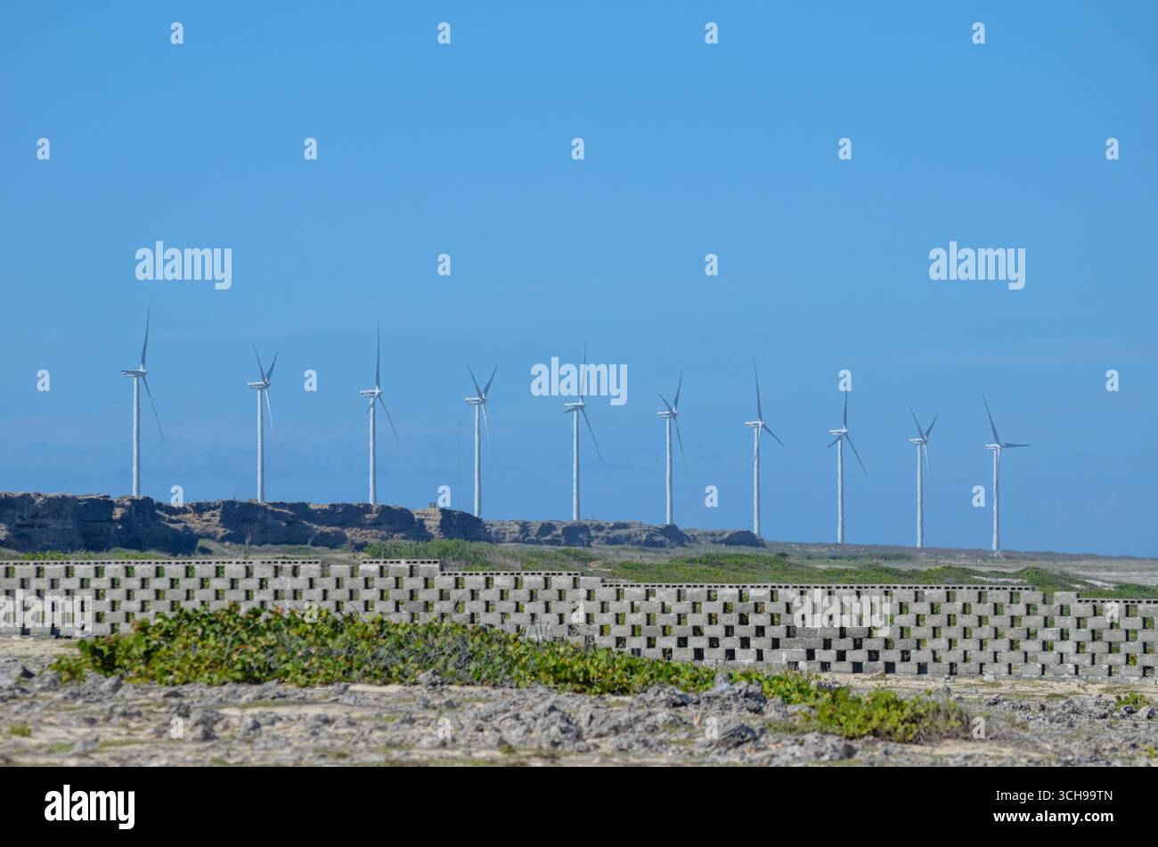 Aruba wind farm with wind turbines against clear blue sky Stock Photo ...
