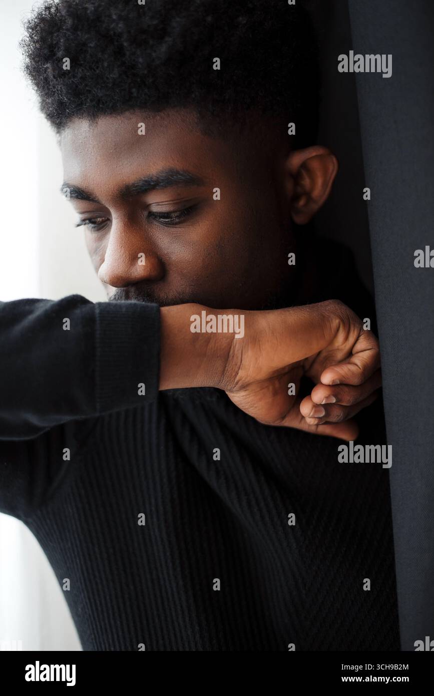 Depressed sad african man alone hi-res stock photography and images - Alamy