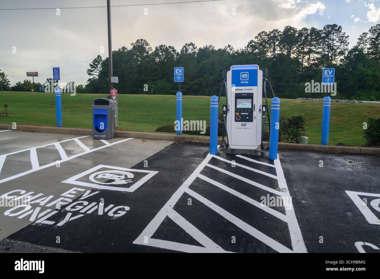 Pavement markings at an EV charging station Stock Photo - Alamy
