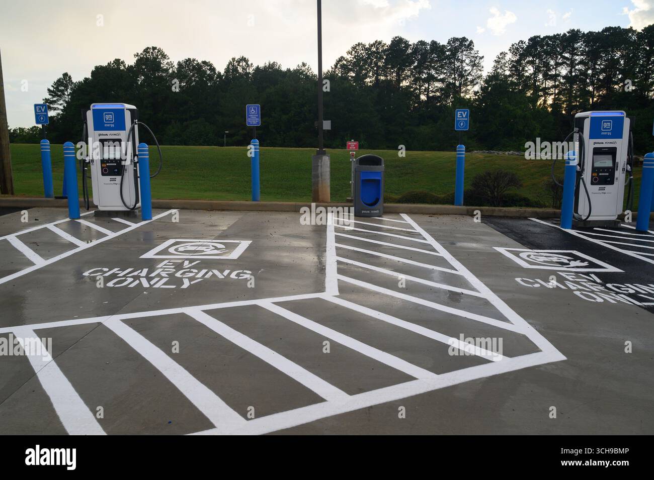 Pavement markings at an EV charging station Stock Photo - Alamy