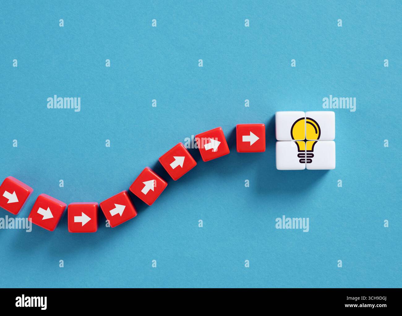 Red arrows pointing towards a lightbulb symbolizing innovation, new ...