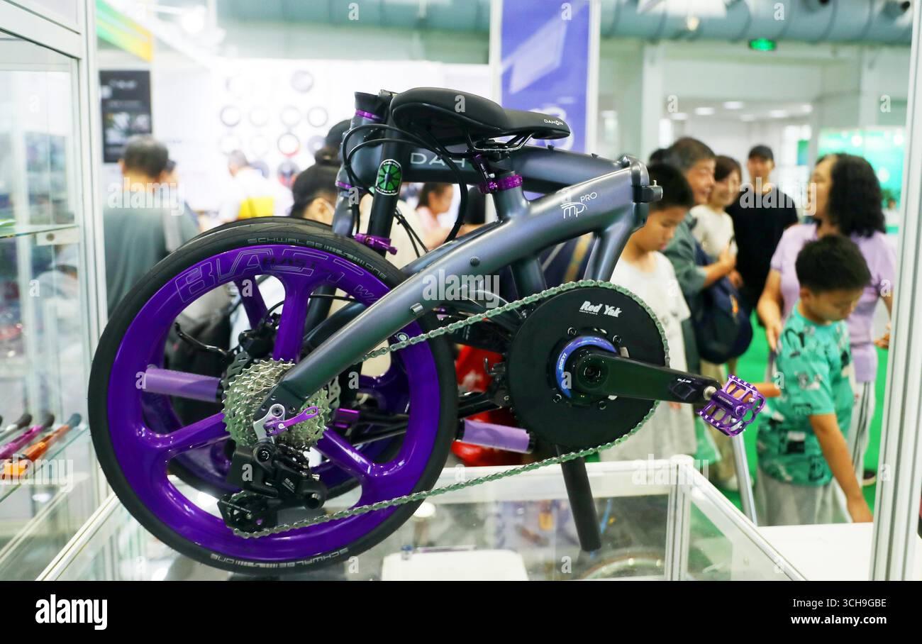 People visit the Beijing International Bike Sports and Equipment ...