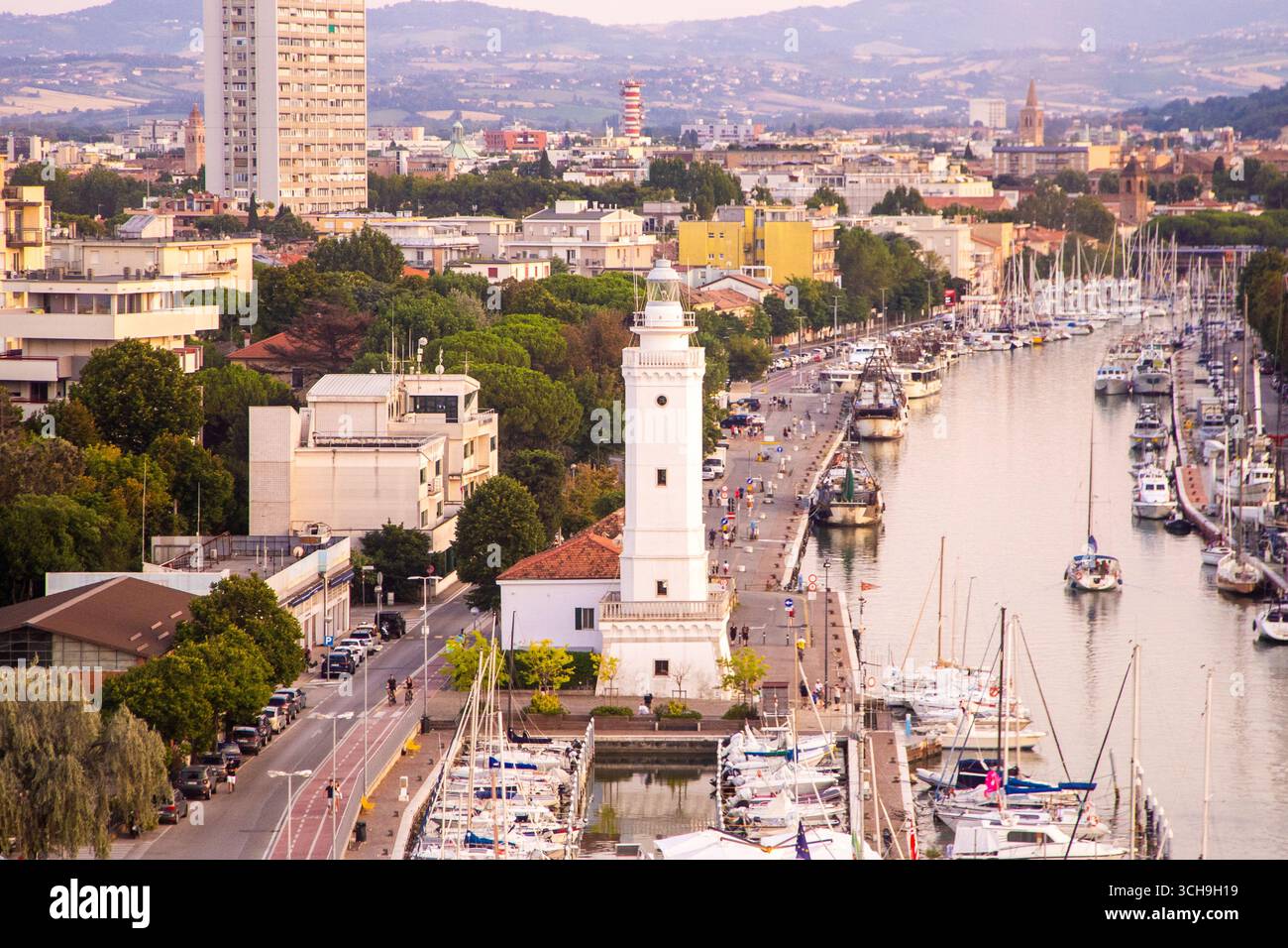 White lighthouse in the port of the Italian city of Rimini top view ...