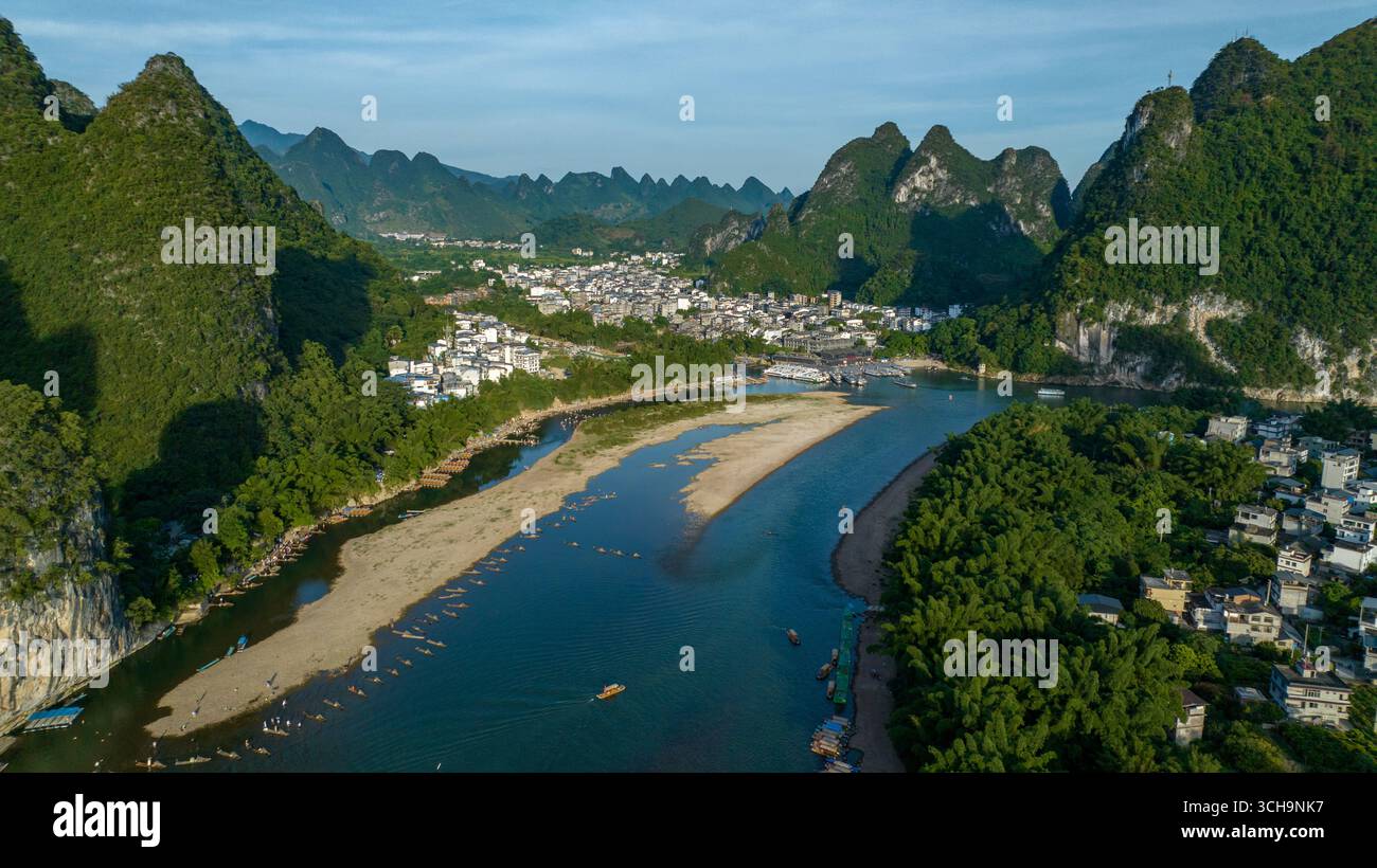 Aerial view of the serene Li River winding through the karst mountains ...