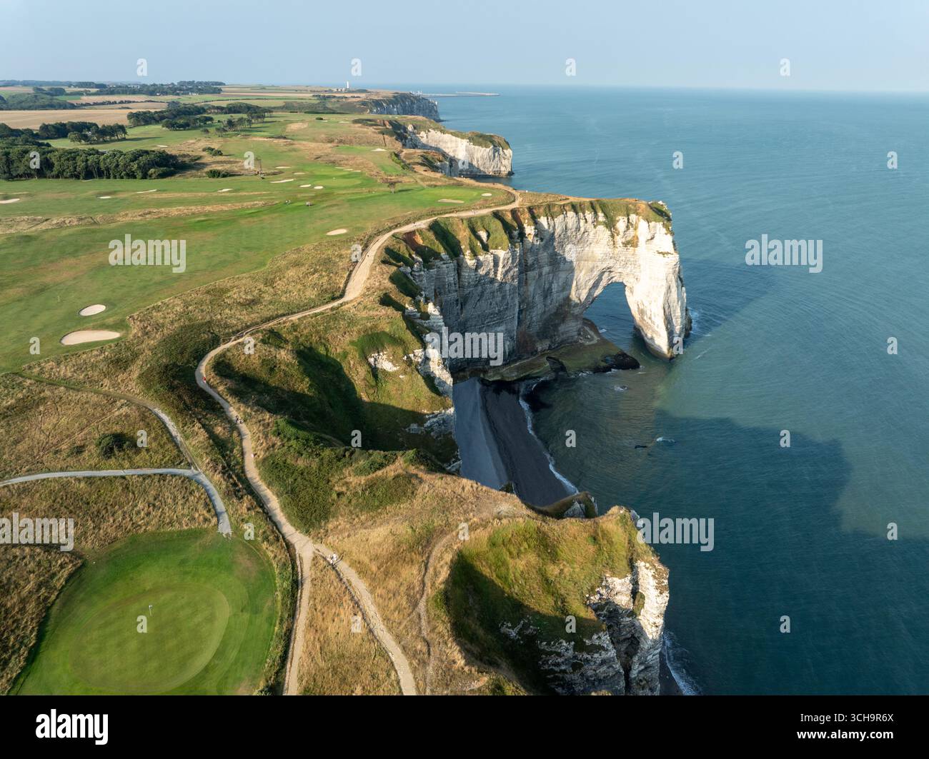 Aerial view of alabaster cliffs meet the turquoise sea, where the ...
