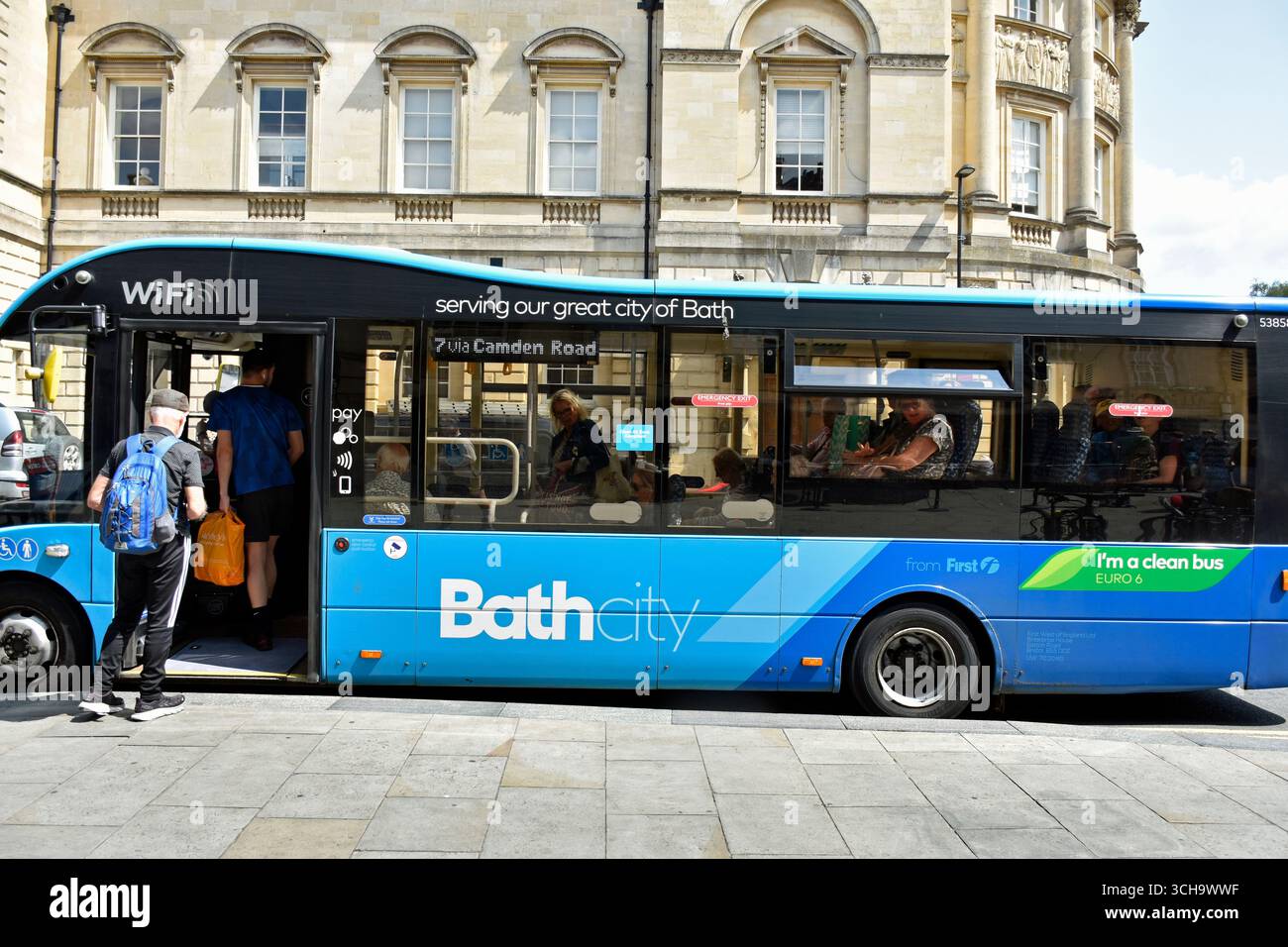 Bus stop passengers in hi-res stock photography and images - Alamy