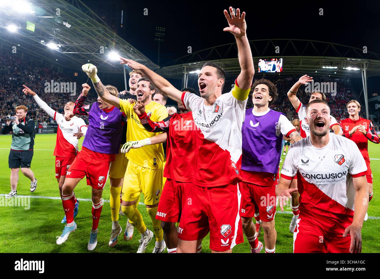 UTRECHT, NETHERLANDS - AUGUST 28: Matisse Didden of FC Utrecht, Goalkeeper Vasilis Barkas of FC ...