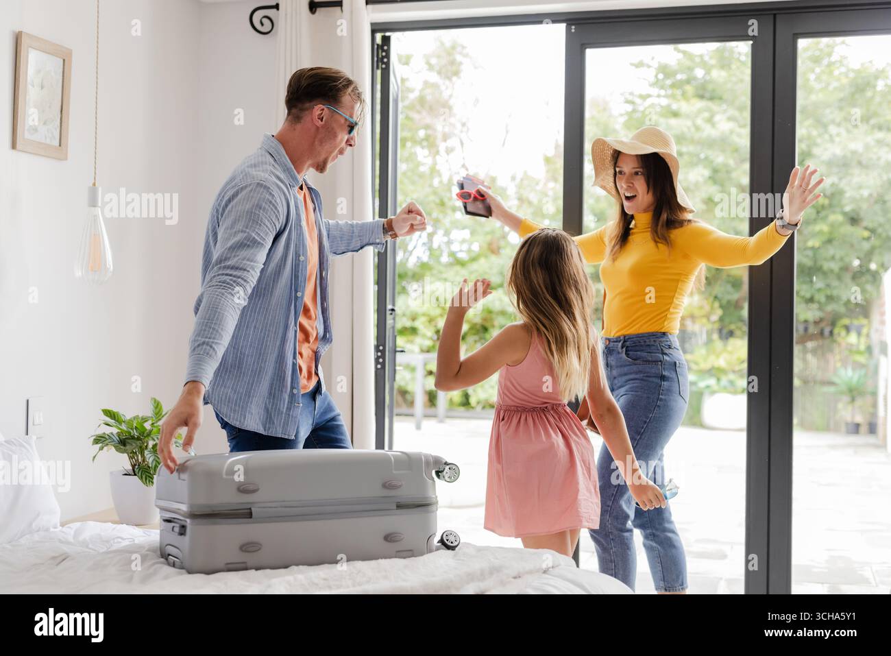 Family celebrating vacation packing hi-res stock photography and images ...