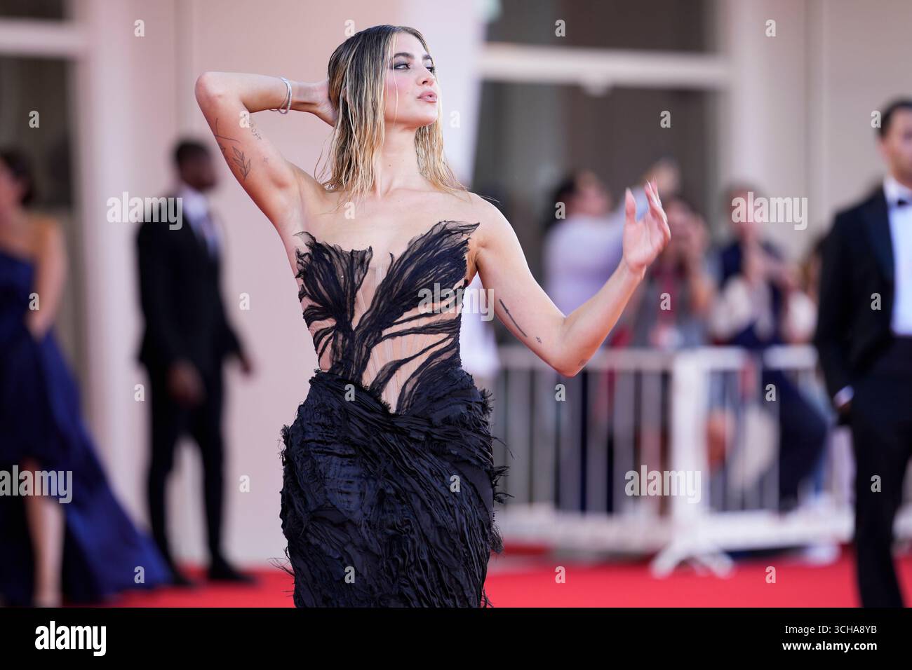 Alessia Lanza attends the "Father Mother Sister Brother" red carpet ...