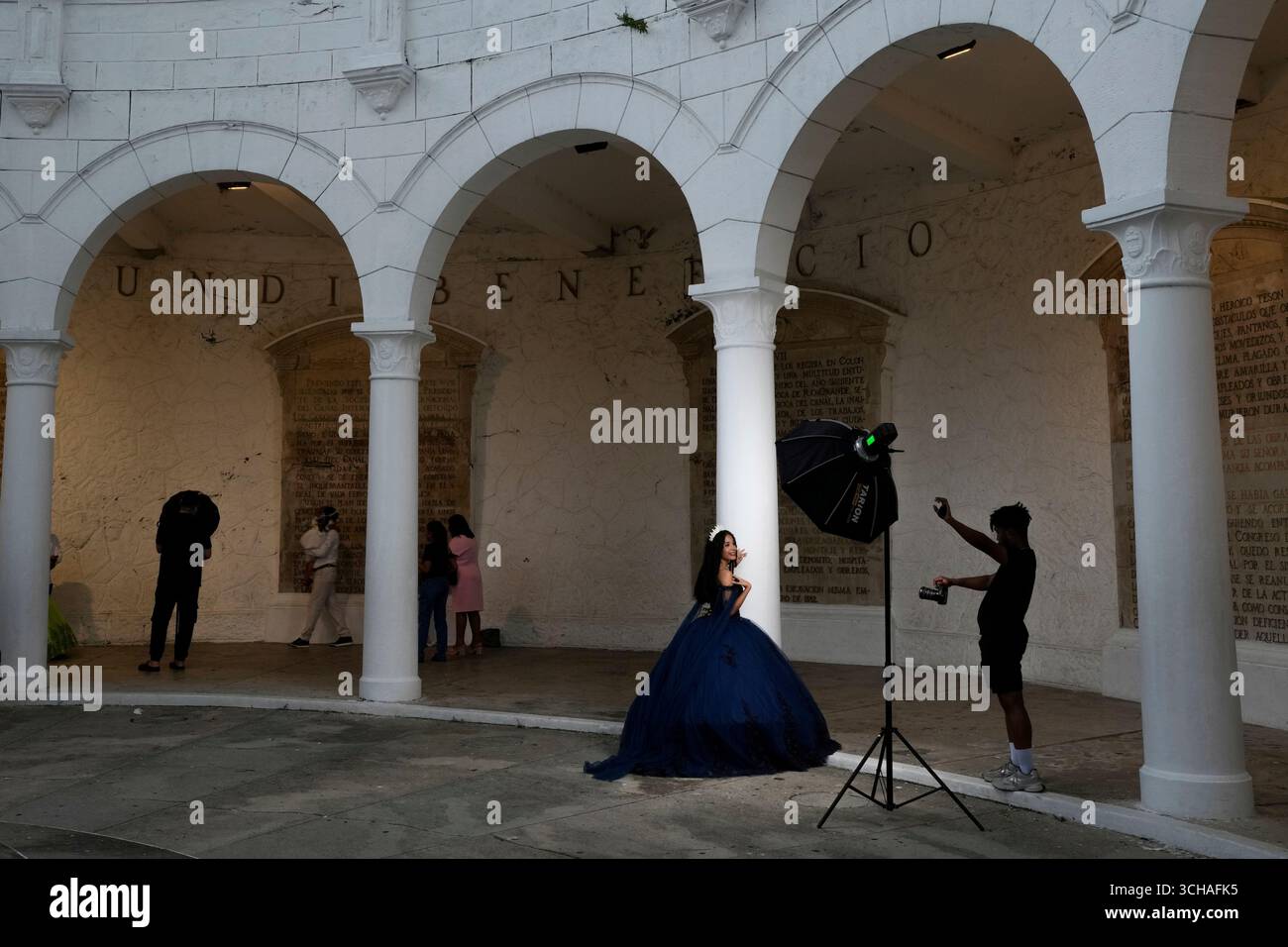 A young woman poses for photos inside a former bastion that was part of ...