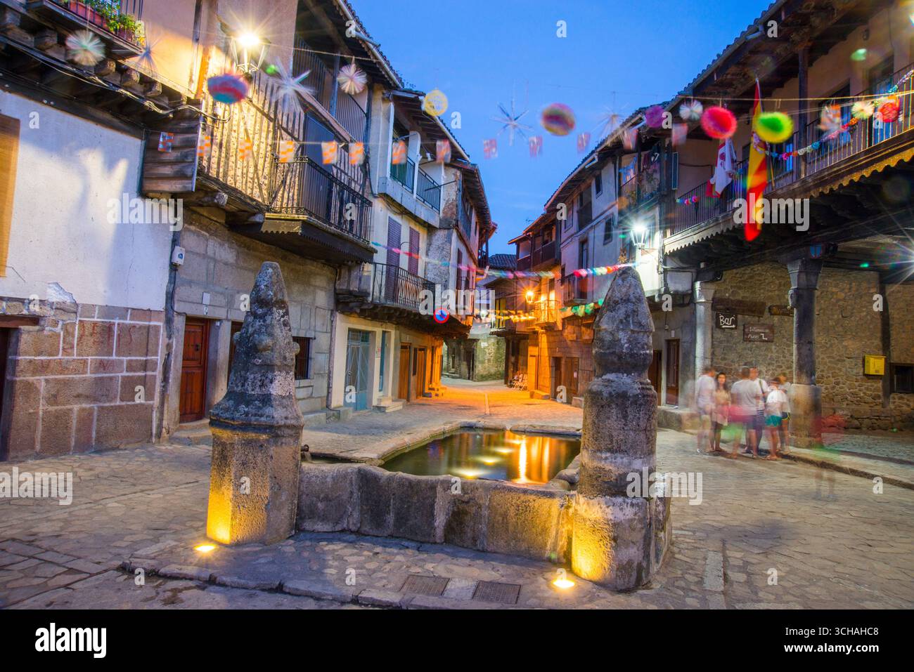 Main Square and fountain, night view. San Martin del Castañar, Sierra ...