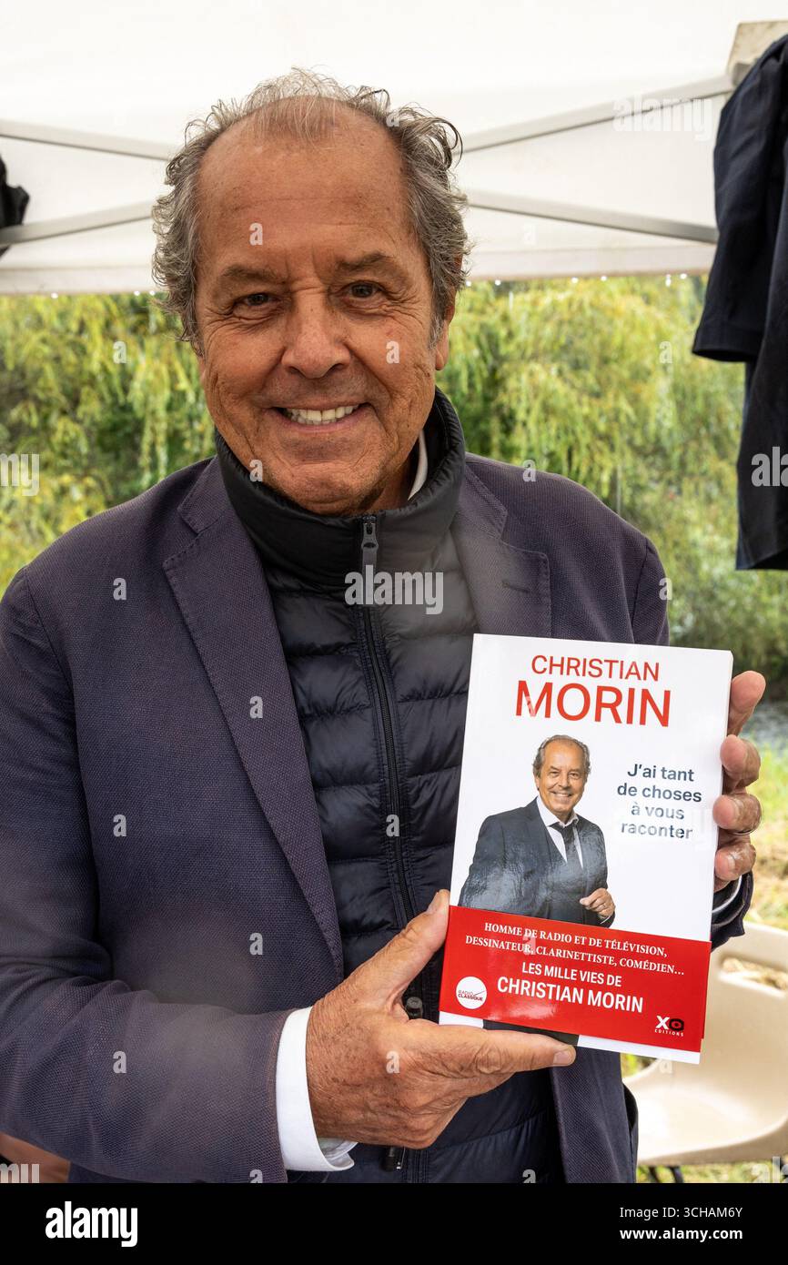 Christian Morin participating in the annual book signing event at the ...