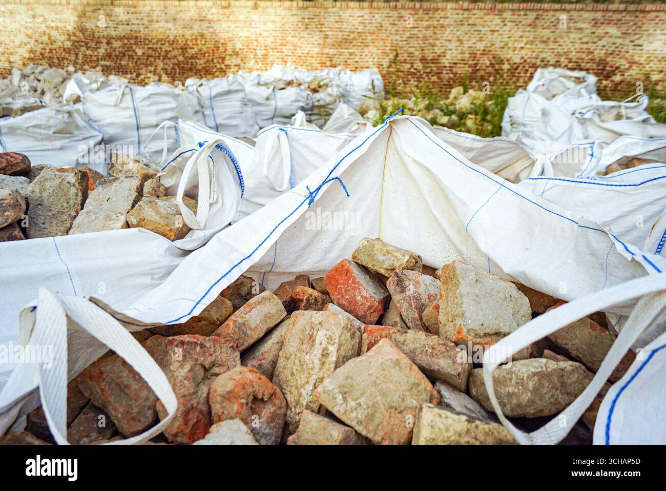 Red brick collection from historic fortress demolition ready for ...