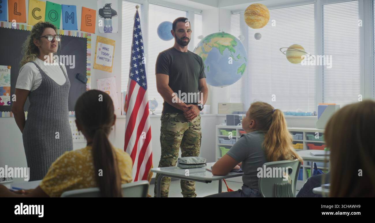 American Military Man Giving Lecture to Curious Primary School Students ...
