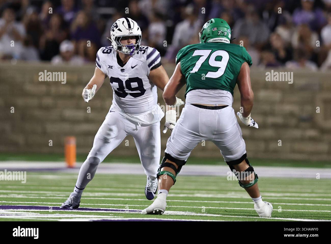 MANHATTAN, KS - AUGUST 30: Kansas State Wildcats defensive end Travis ...