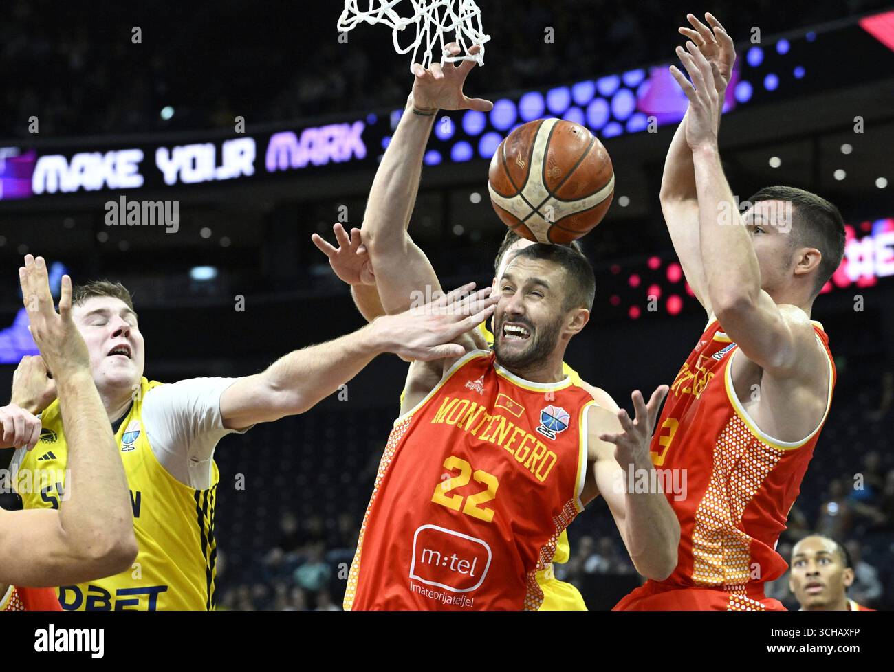 From left, Simon Birgander of Sweden, Igor Drobnjak and Dordije Jovanovic of Montenegro during ...