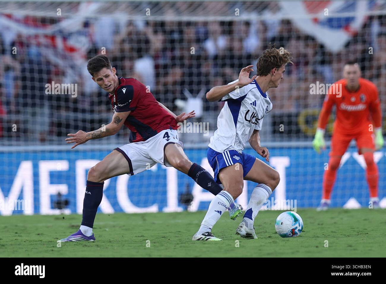 Nico Paz (Como)Martin Vitik (Bologna) during the Italian Championship ...