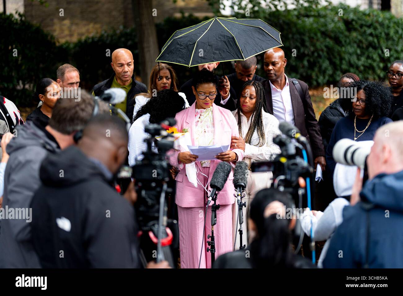 Linda Westcarr (centre) the mother of Kennedi Westcarr-Sabaroche stands ...