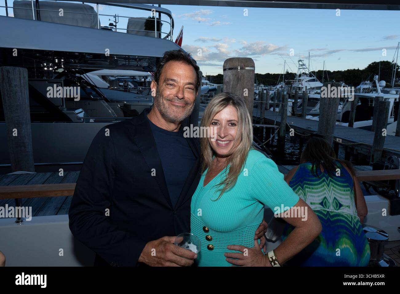 Eric Margolis and Andrea Bartzen attends Global Passion Projects Hamptons 2025 VIP Yacht Party ...