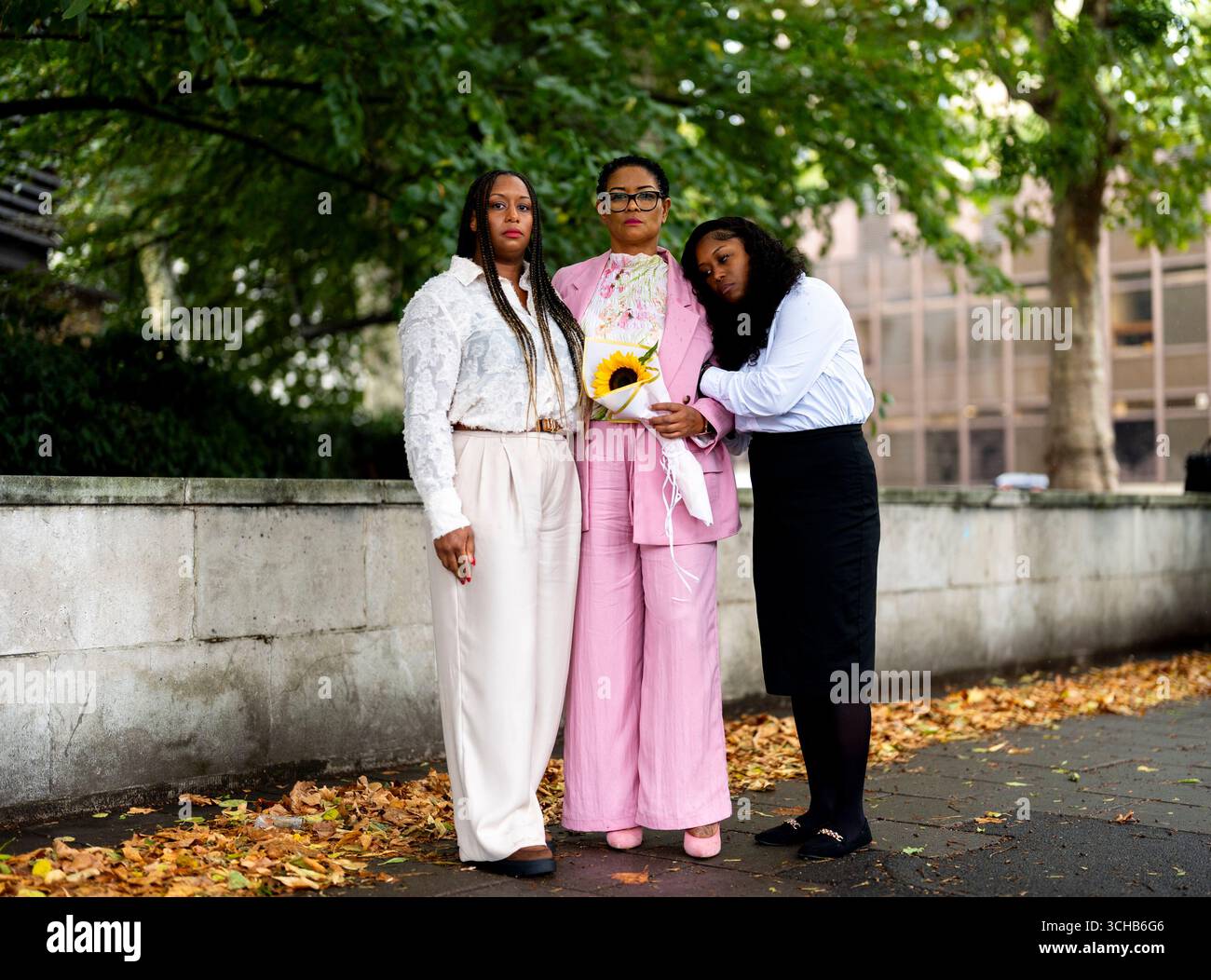 Linda Westcarr (centre) the mother of Kennedi Westcarr-Sabaroche stands ...