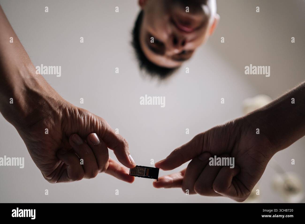 Male hand installing sim card hi-res stock photography and images - Alamy