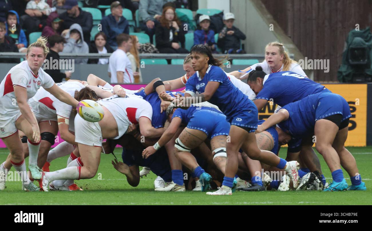L-R England's(Red Roses)Marlie Packer and Samoa’s Ana AFUIE in action ...