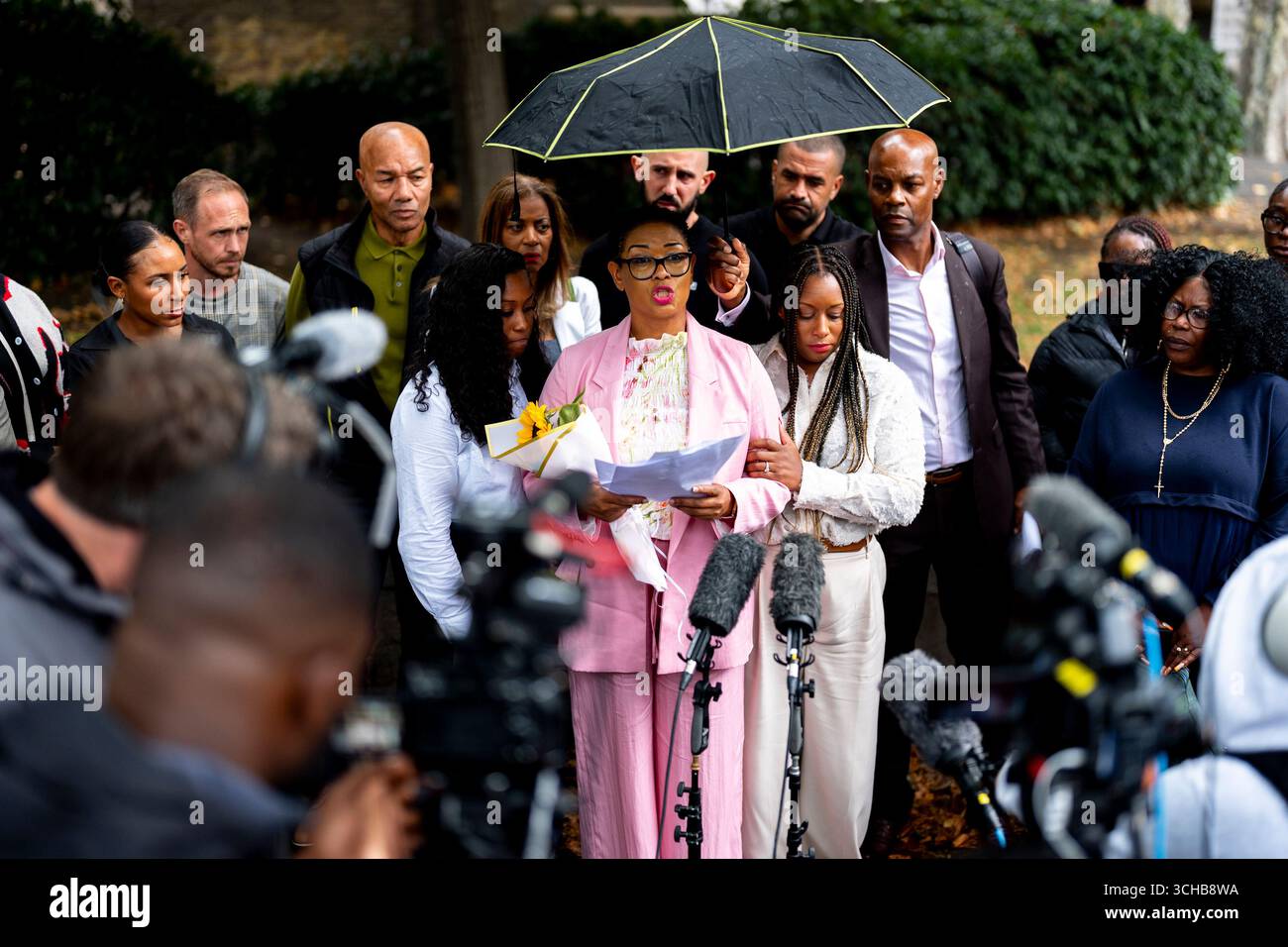 Linda Westcarr (centre) the mother of Kennedi Westcarr-Sabaroche stands ...