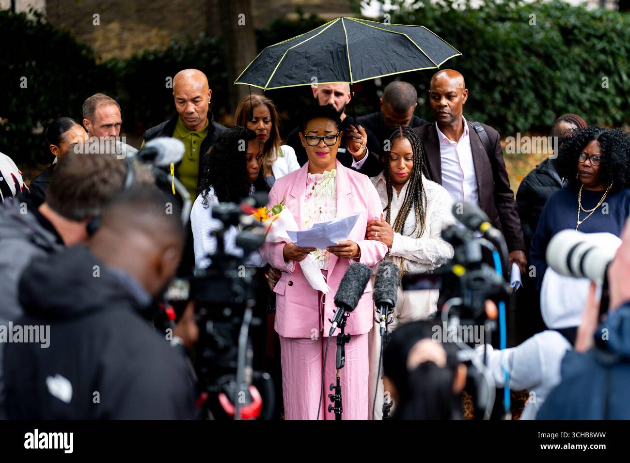 Linda Westcarr (centre) the mother of Kennedi Westcarr-Sabaroche stands ...