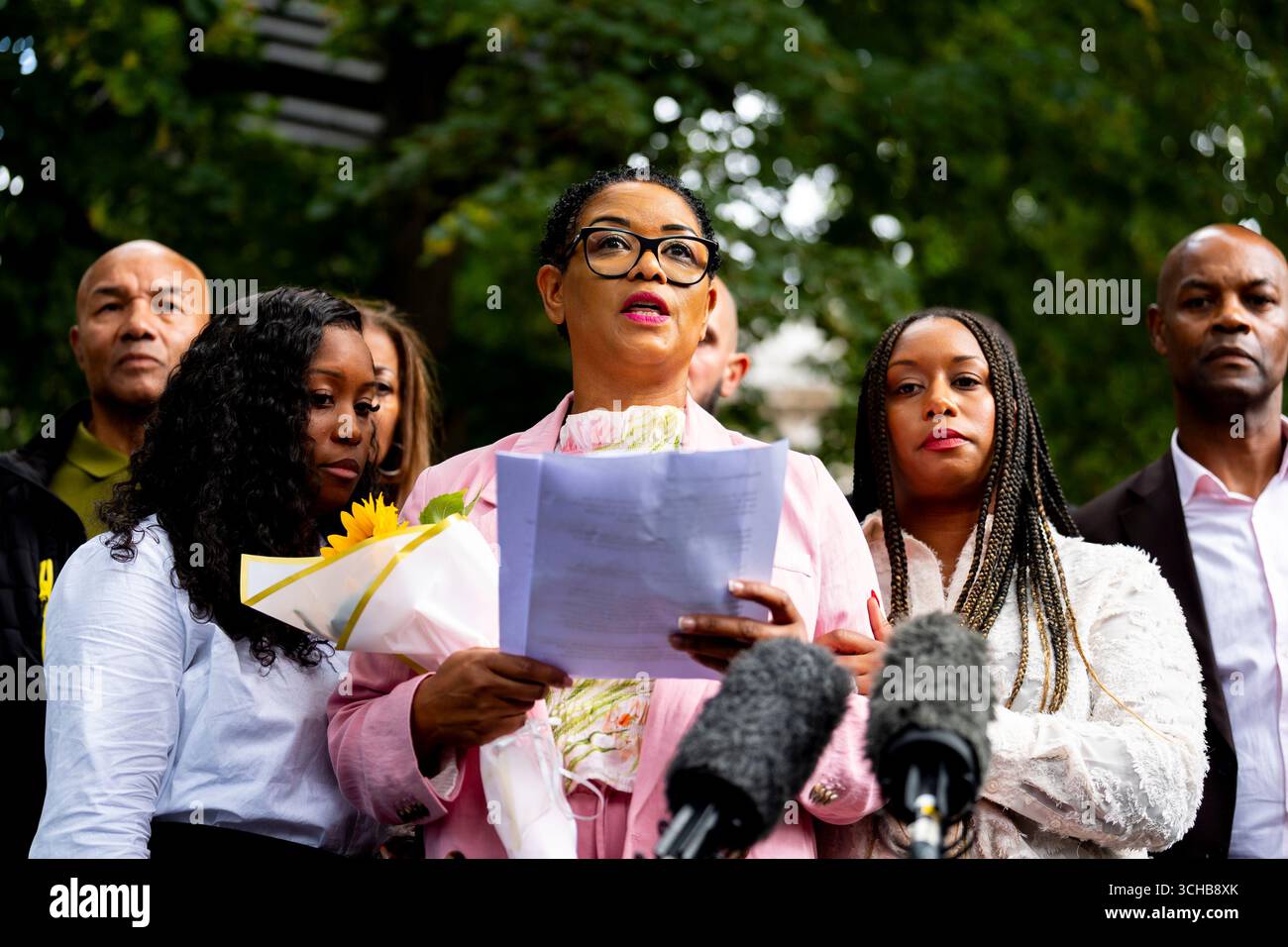 Linda Westcarr (centre) the mother of Kennedi Westcarr-Sabaroche stands ...