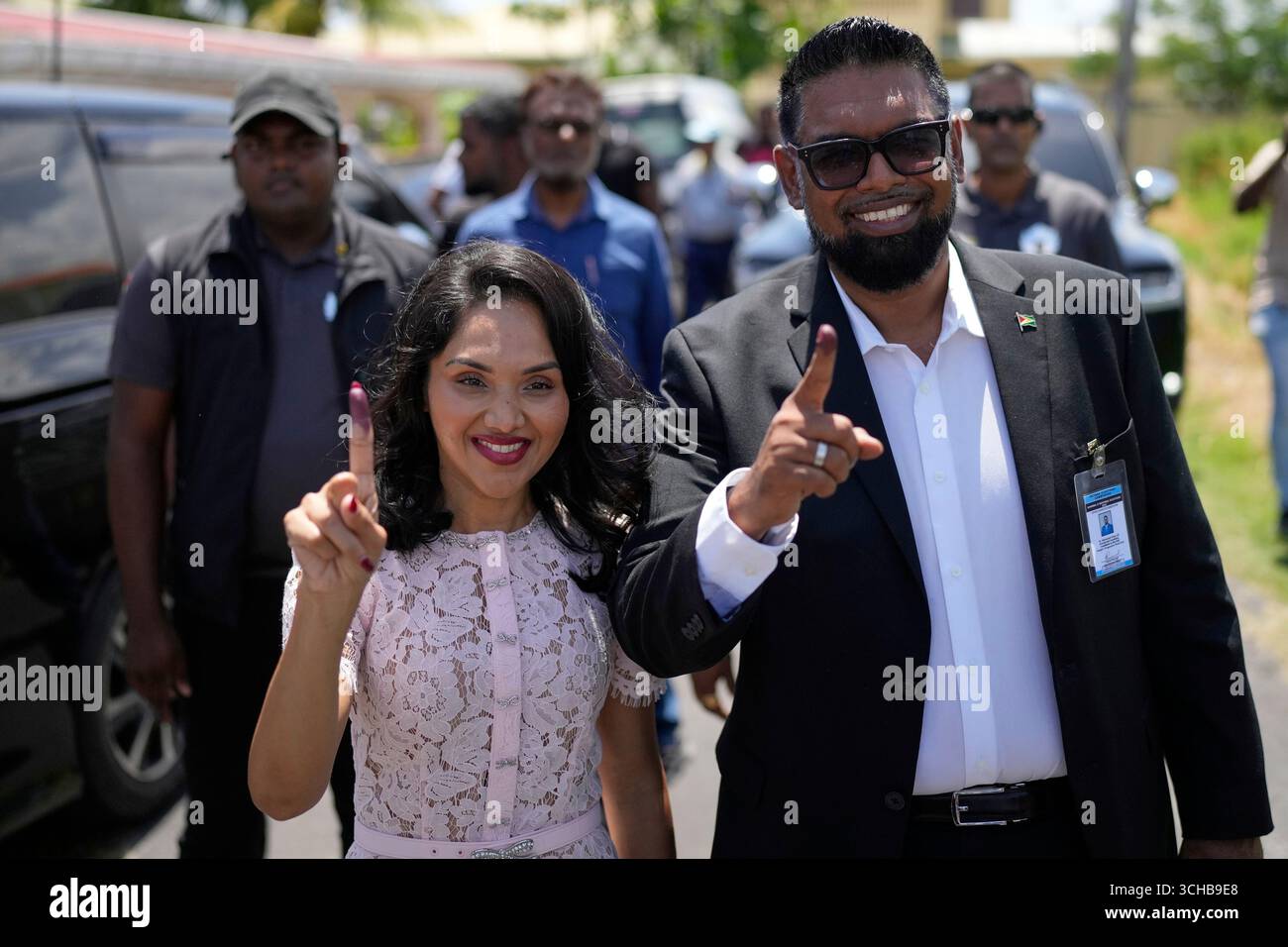 President Irfaan Ali, seeking another term, and his wife Arya Ali show ...