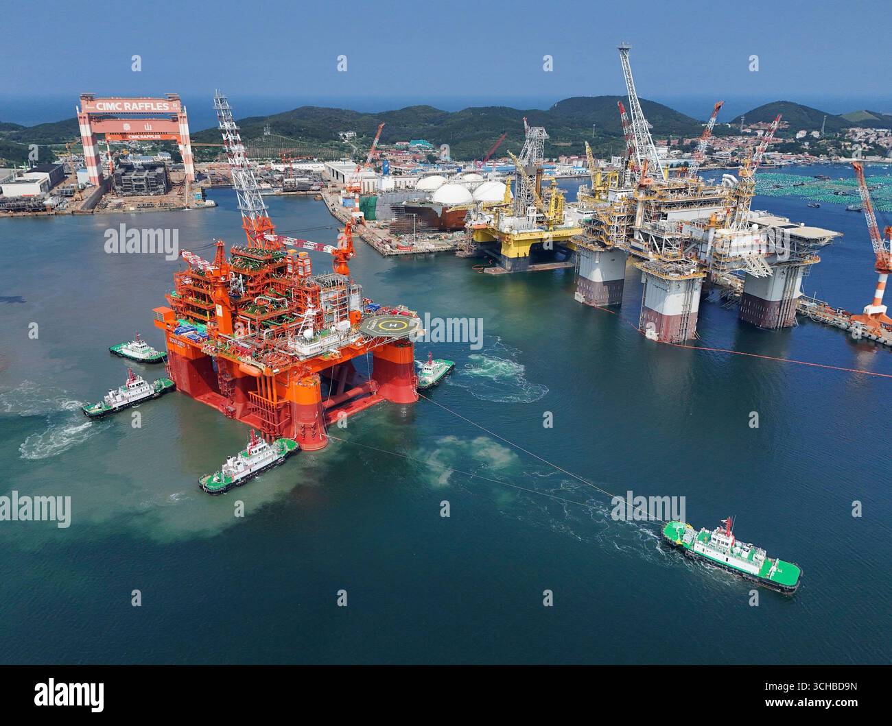Tugboats push Scarabeo 5, a floating production unit (FPU) converted ...