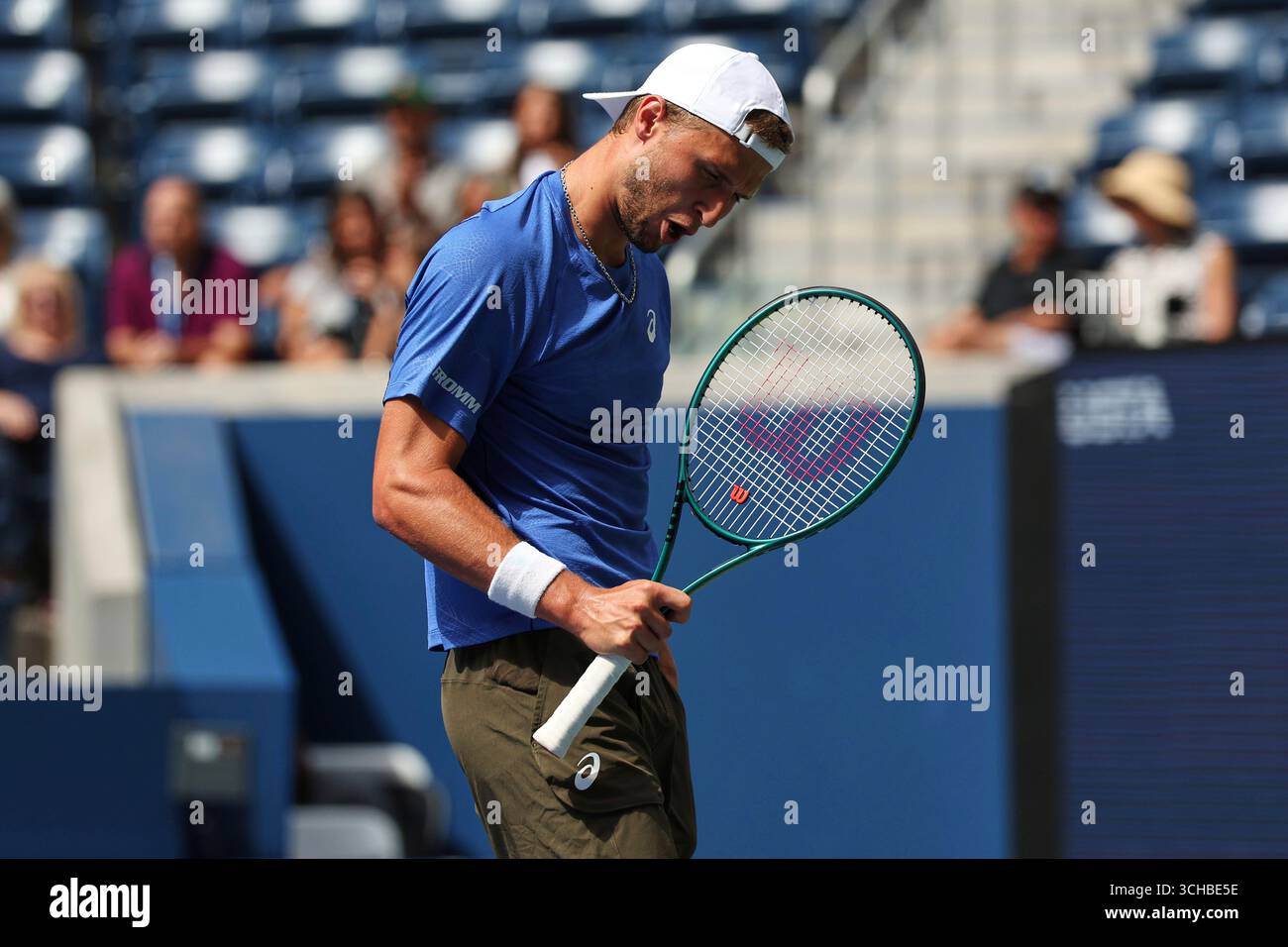 Leandro Riedi, of Switzerland, reacts during his match against Alex de ...