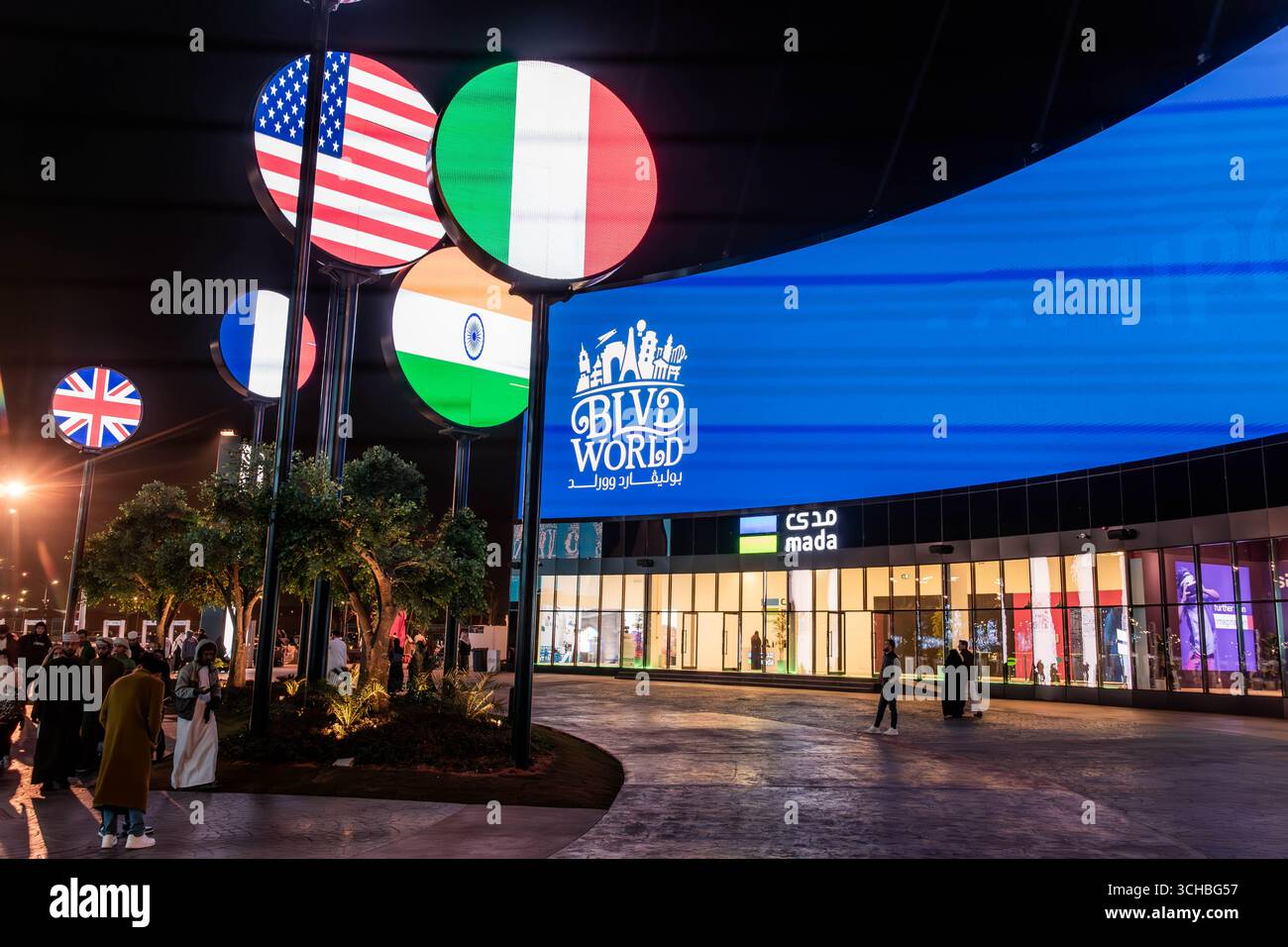 Main entrance plaza with the curved LED canopy showing “BLVD WORLD” and ...
