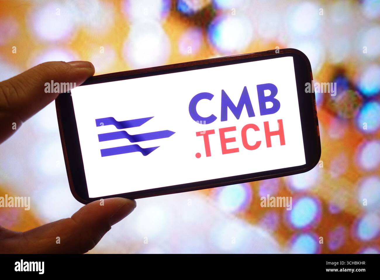 In this photo illustration, a Cmb.Tech company logo is seen displayed ...