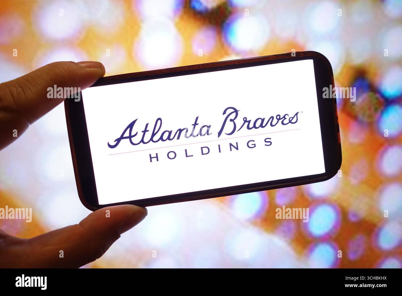 In this photo illustration, a Atlanta Braves company logo is seen ...