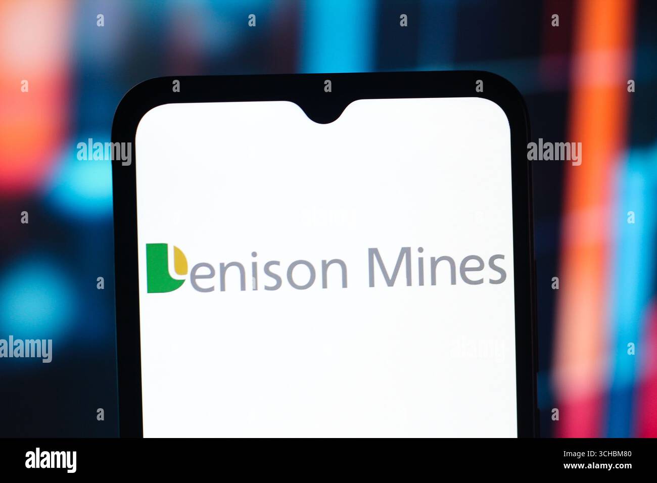 In this photo illustration, the Denison Mines logo is seen displayed on ...