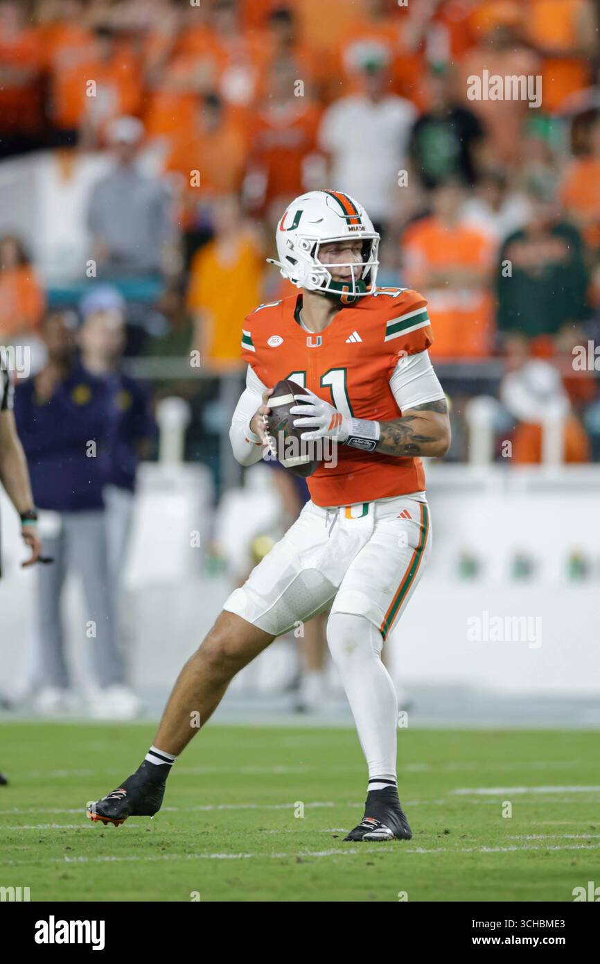 Miami, FL: Miami Hurricanes quarterback Carson Beck (11) drops back to ...