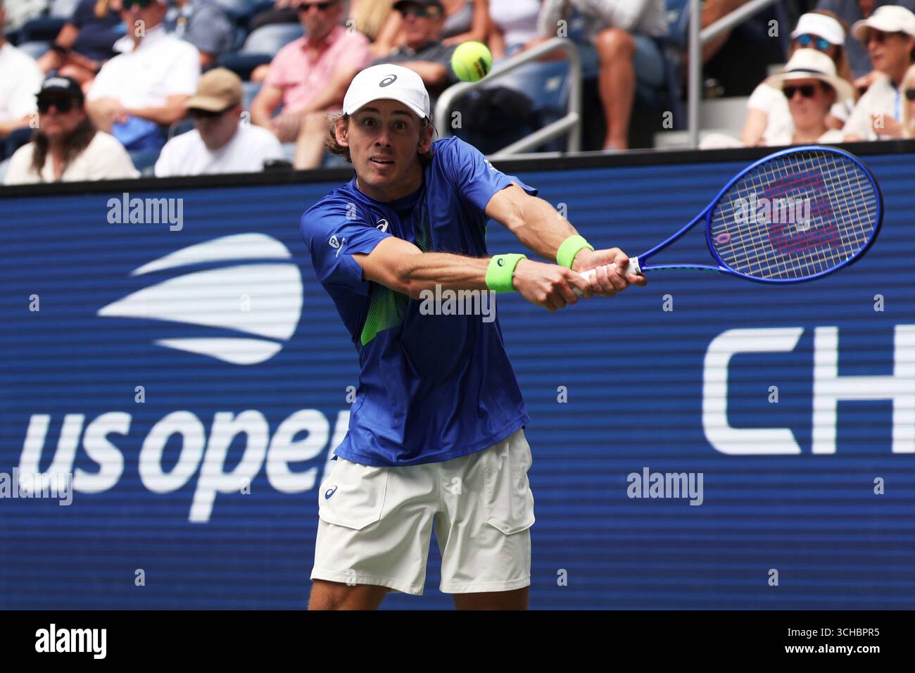 Alex de Minaur, of Australia, returns a shot against Leandro Riedi, of ...