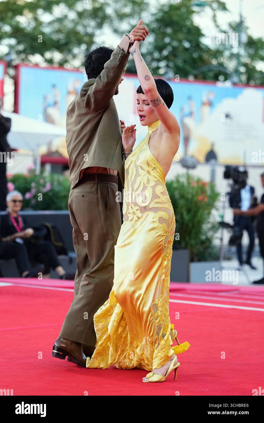Avan Jogia, left, and Halsey pose for photographers on the red carpet ...