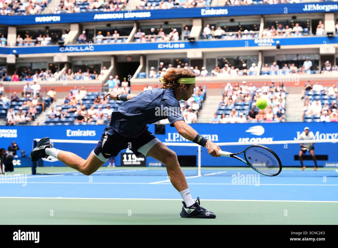 Andrey Rublev, of Russia, reaches for a shot against Felix Auger-Aliassime, of Canada, during ...