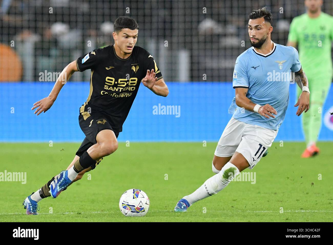 Reda Belahyane of Hellas Verona (L) and Valentin Castellanos of SS Lazio (R) seen in action ...