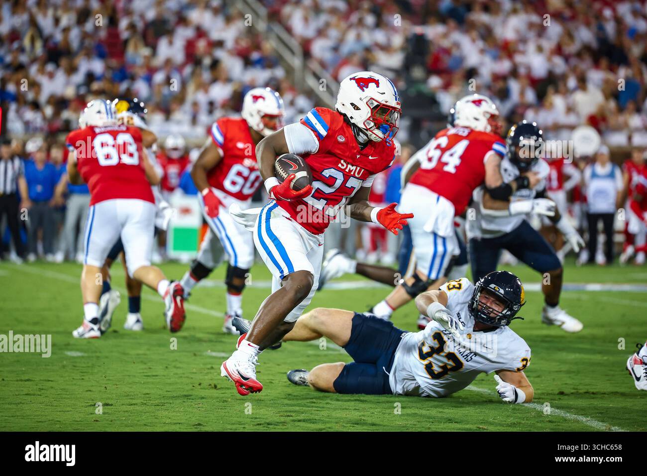 DALLAS, TX - AUGUST 30: SMU Mustangs running back TJ Harden (#27) runs ...
