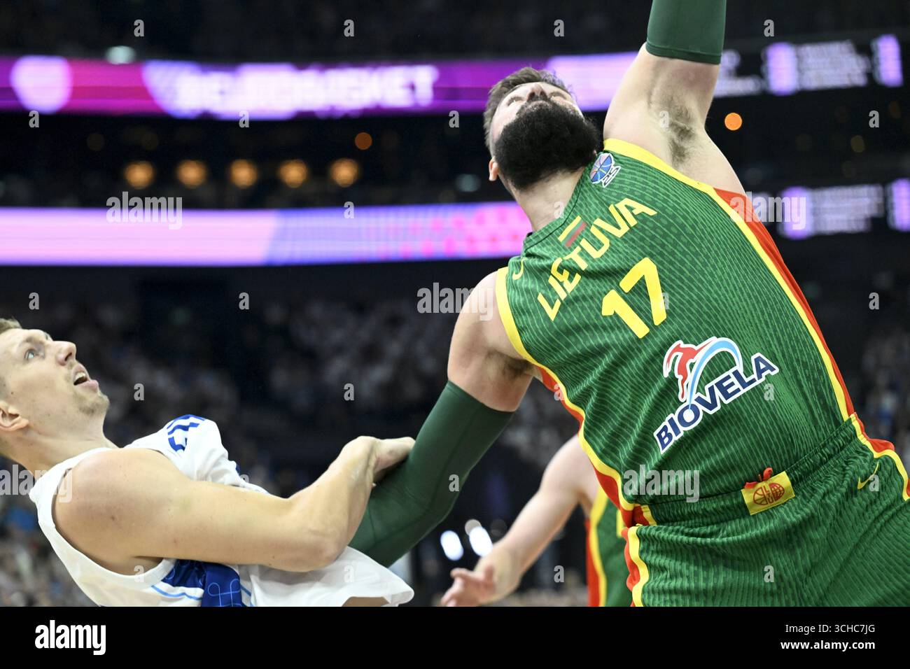 Lithuania's Jonas Valanciunas (17) and Finland's Alexander Madsen ...
