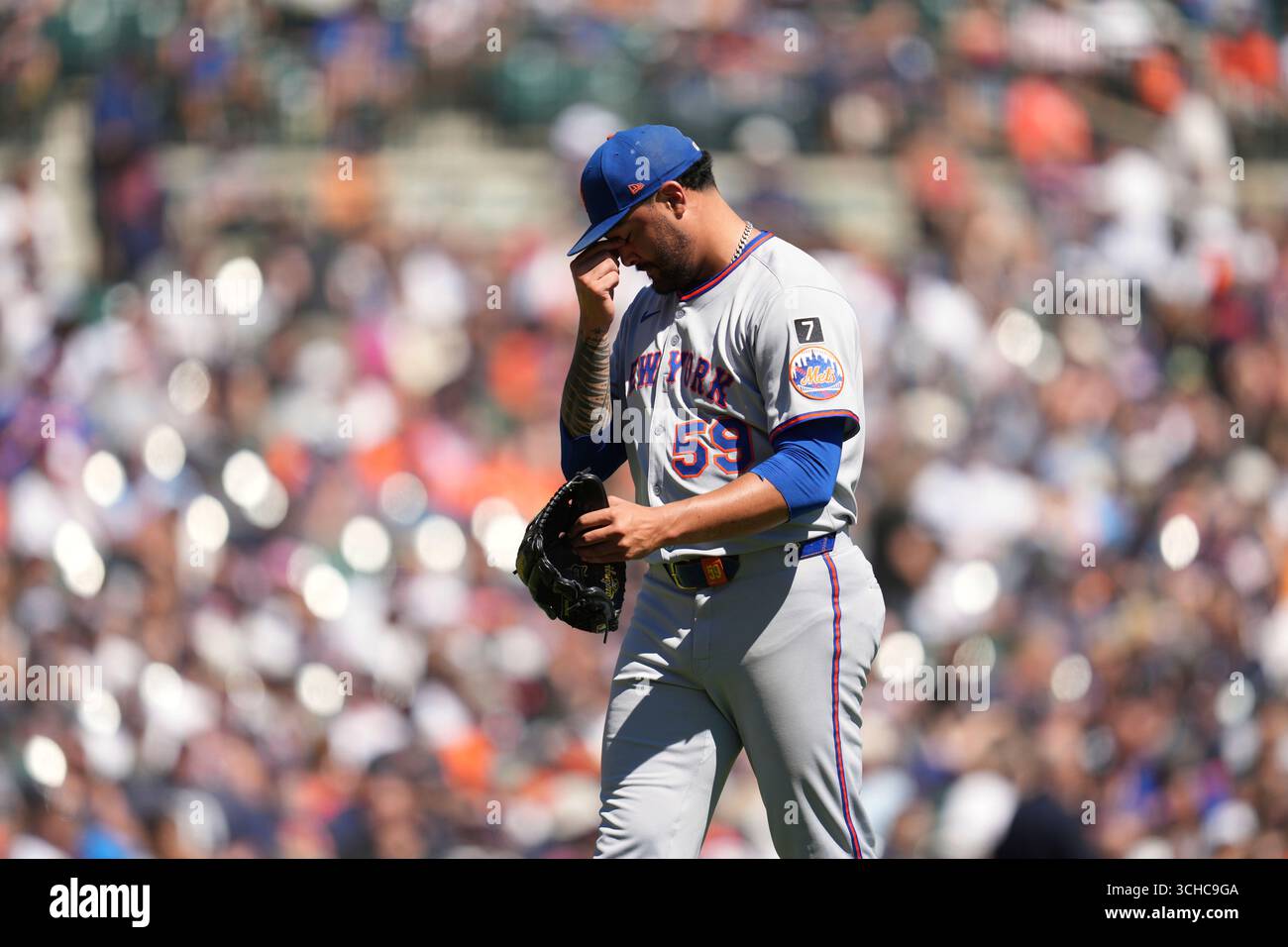 New York Mets pitcher Sean Manaea walks to the dugout after being ...
