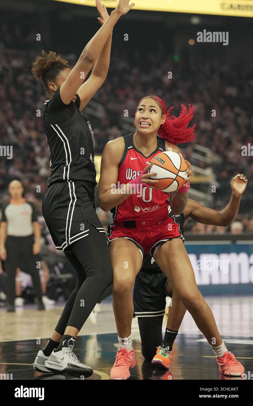 Washington Mystics forward Shakira Austin (0) drives to the basket ...