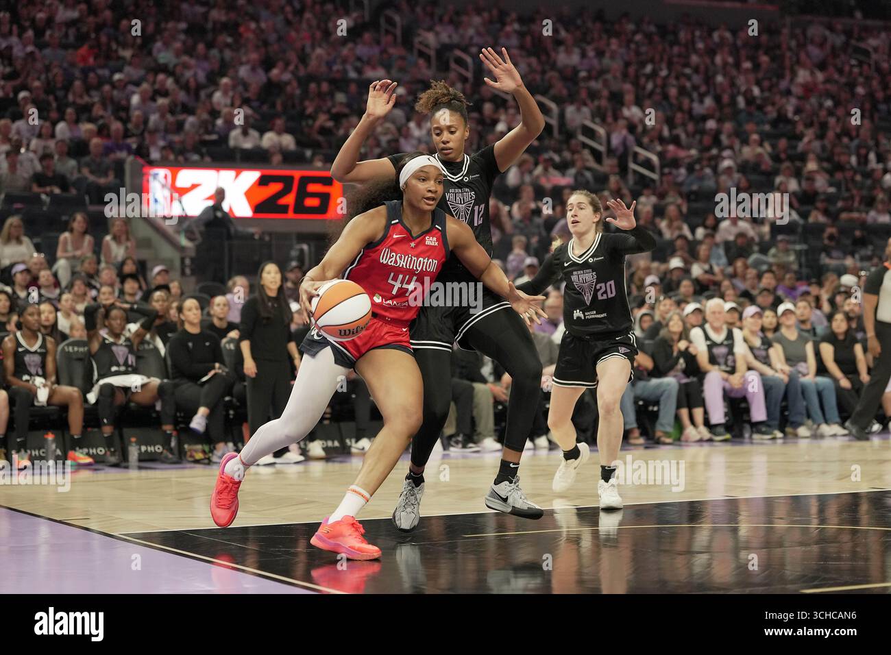 Washington Mystics forward Kiki Iriafen (44) drives in against Golden ...